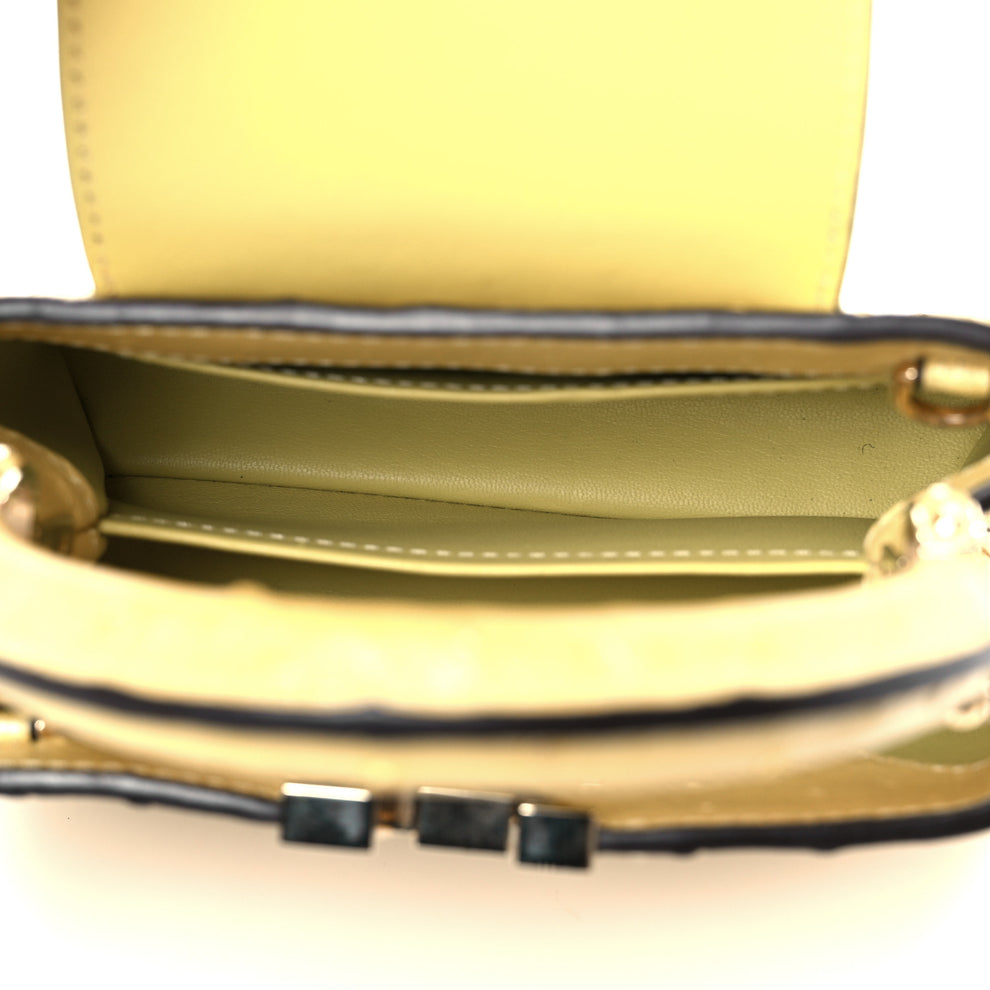 Louis Vuitton Iridescent Ostrich Capucines Mini Yellow 1779175 ...