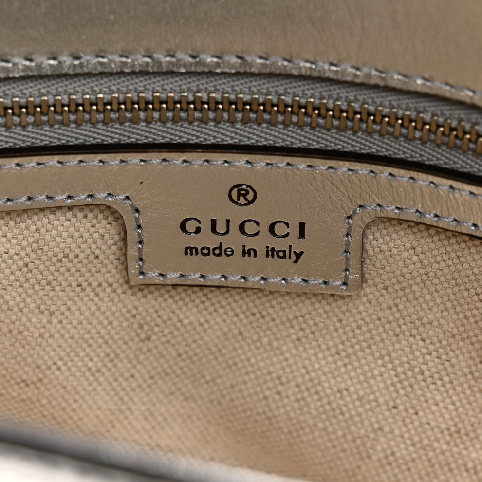 Gucci Metallic Calfskin Small Horsebit 1955 Asymmetric Shoulder Bag Silver 1792885 – FASHIONPHILE